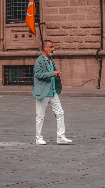 man walking smoking cigarette male by OffiDocs
