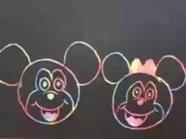 Mickey Mouse and Minnie Mouse on a Rainbow