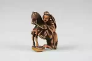 Netsuke of Equestrian Figure on a Go Board by